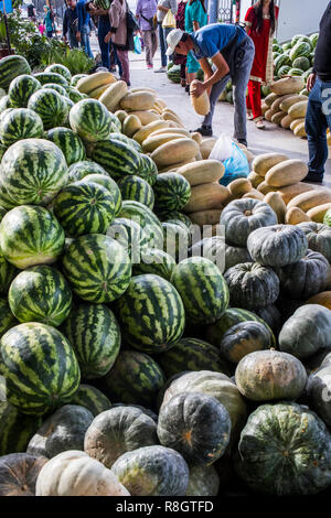 Man selling watermelons at Siob Bazaar in Samarkand Stock Photo - Alamy