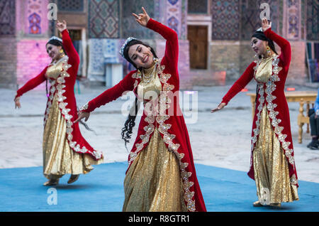 Uzbek folk show in the yard of Sher Dor Madrasah, Registan Square ...