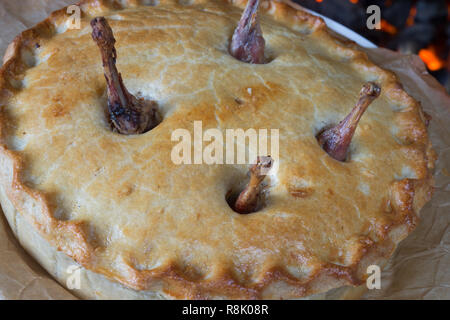 Sparrow pie based on a recipe first published in 1736 with a slice cut ...