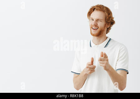 Man doing the finger guns gesture, fingers making a gun symbol, hand ...