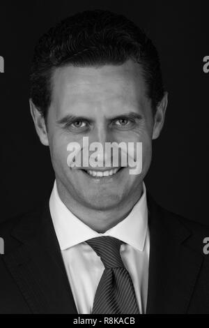 a man in a jacket and tie emotions successful Job career Stock Photo ...