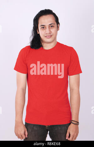 Photo of man in red T-shirt with safety rope on background of mountain ...