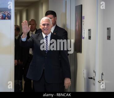 Vice President Mike Pence waves as he arrives to speak at a campaign ...