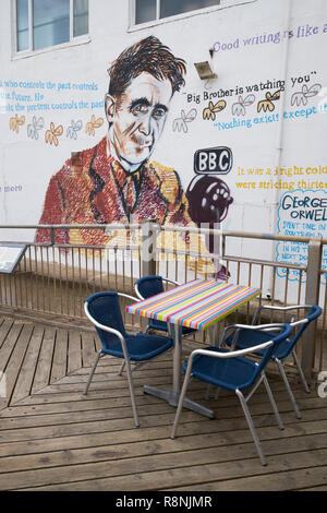 Artwork by street artist 'Pure Evil' inspired by George Orwell. Southwold Pier, Southwold ...