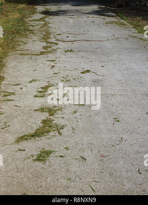 Close up of pedestrian walk path with scattered sand to protect from ...