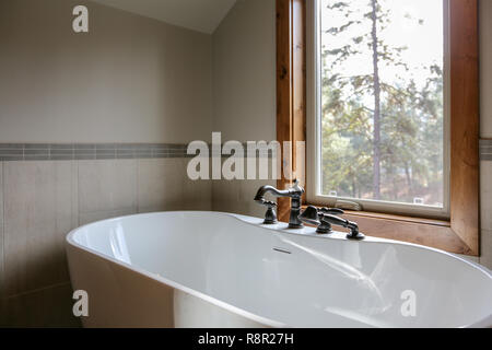 View of a toilet under a window Stock Photo - Alamy