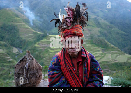 Senior Ifugao man in traditional costume. Banaue Rice Terraces in the ...