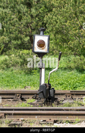 Railroad tracks stretches and green grass and trees. Railway road ...