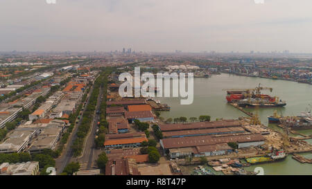 aerial view cargo and passenger seaport with ships and crane Tanjung ...