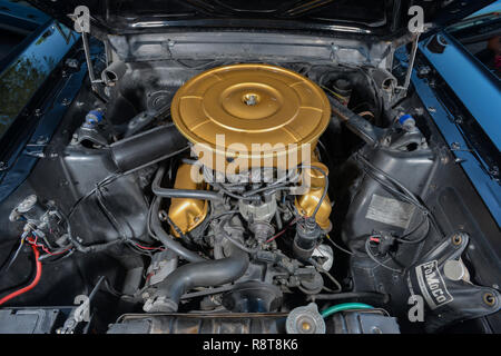A large V8 car engine with shiny air intake trumpets Stock Photo - Alamy