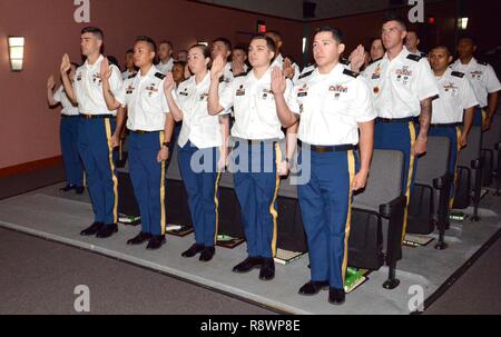 SCHOFIELD BARRACKS, Hawaii- Noncommissioned officer (NCO) inductee, Sgt ...