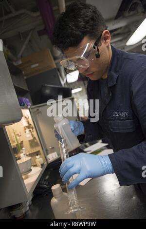PHILIPPINE SEA (March 13, 2017) Gunner’s Mate Seaman Yusef Ali Reynolds ...