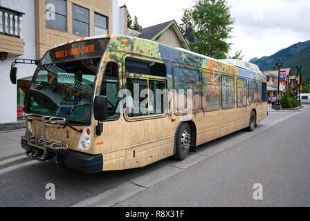 Roam bus with pictures of wildlife in Banff village, Banff National ...