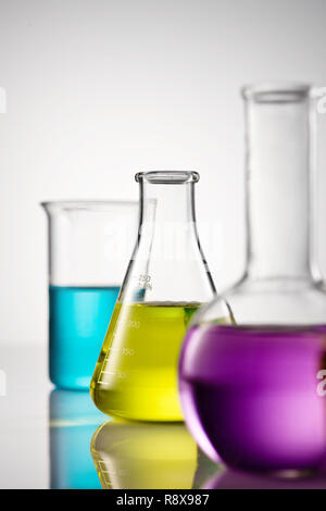 triangular flask with blue fluid Stock Photo - Alamy