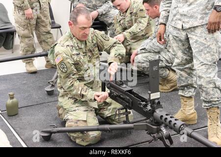 Soldiers with the 620th Combat Sustainment Support Battalion fire the ...