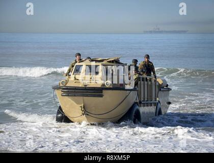 Sailors assigned to Beachmaster Unit One (BMU-1) guide a Medium Stock ...