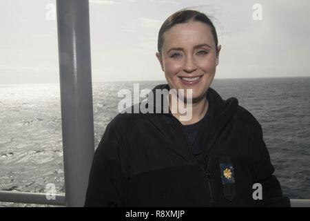 U.S. Navy Lt. Cmdr. Jennifer Forbus, left, the executive officer of the ...