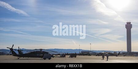 A 305th Rescue Squadron HH-60 and 79th Rescue Squadron HC-130J are ...