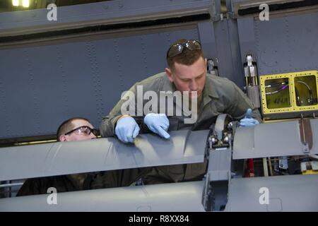 Staff Sgt. Sean Heart, 434th Maintenance Squadron aircraft mechanic, and Senior Airman Joseph ...