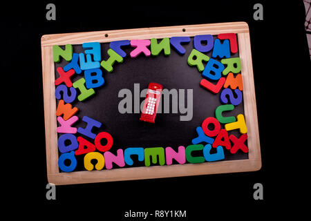 Telephone booth and colorful letters of Alphabet made of wood Stock ...