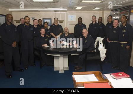 U.S. Army Capt. Scott Steele, left, with the U.S. Military Transition ...