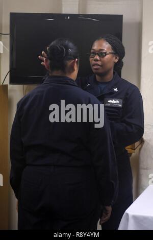 Operations SPECIALIST 1ST Class (SW) William Tanner plots mine ...