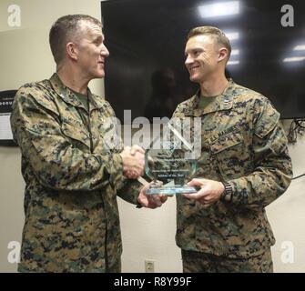 U.S. Marine Corps Capt. Jason O'neil, top, and Capt. Jeffrey Monroe ...