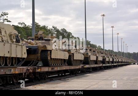 Abrams Main Battle Tanks and Bradley Fighting Vehicles are stored in a ...