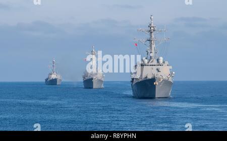USS Pinckney, USS Howard and USS Shoup steam in formation behind USS ...