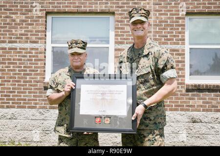 U.S. Navy Capt. Brian Tolbert (left) and Master Chief Petty Officer ...