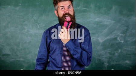 Man scruffy use stapler dangerous way. Hipster teacher formal wear ...