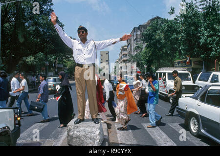 Traffic cop assisting Pedestrian busy road, bombay mumbai, maharashtra ...