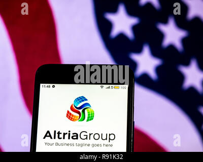 Altria Tobacco company logo seen displayed on smart phone Stock Photo ...