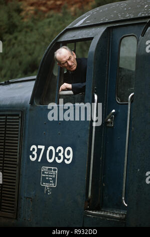 British Rail diesel locomotive driver in Fort William railway station ...