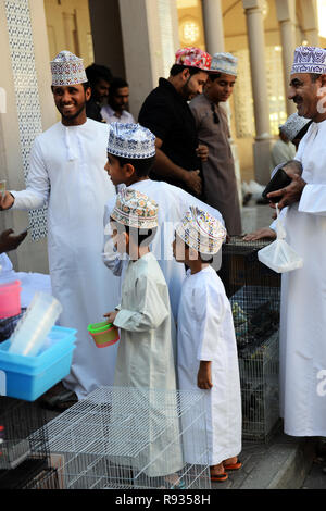Omani boys wearing a traditional Kuma hat Stock Photo - Alamy