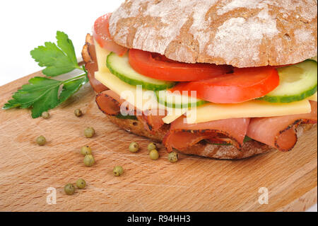 Tyrolean rye flat bread with smoked bacon and cheese Stock Photo - Alamy