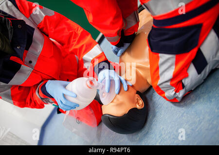 German paramedic trains emergency basics on a puppet Stock Photo - Alamy