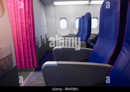First row of seats in a passenger plane. Passenger plane interior ...