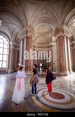 CASERTA, ITALY - SEPTEMBER 24, 2017: Two unknown people at the entrance ...