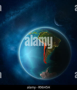 Chile from space on planet Earth at night with visible country borders ...