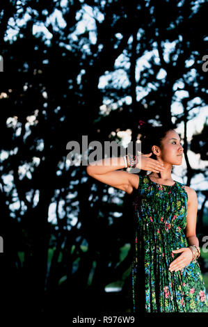 Asian female model poses for pictures in the nature Stock Photo - Alamy