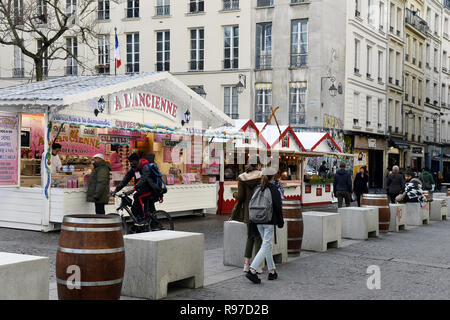 Paris carousel - Chair swing ride in amusement park at Tuileries garden ...