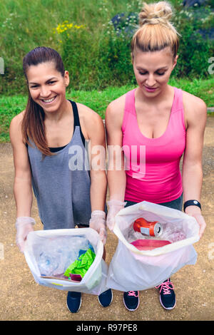 Smiling happy cleaning woman showing blank sign board Stock Photo - Alamy