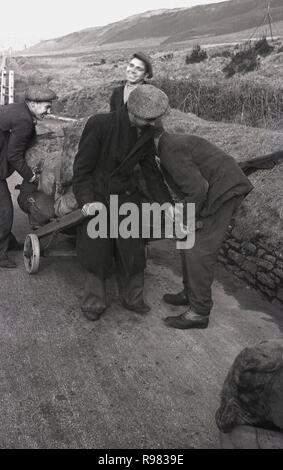 wooden one-wheeled handcart Stock Photo - Alamy
