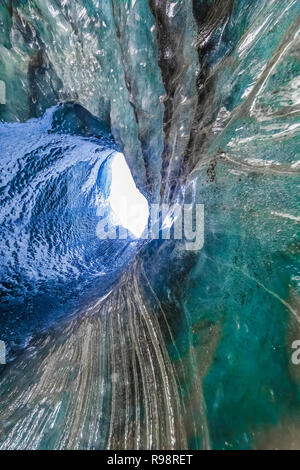 The melted vertical shaft of a moulin, aka glacier mill, the dramatic ...