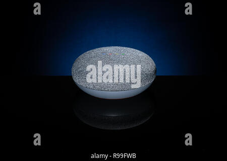 Google home mini and Alexa Echo Dot on white background Stock Photo - Alamy