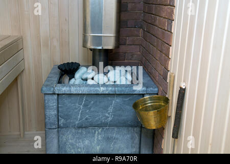 Stove with stones in the Russian bath in the steam room Stock Photo - Alamy
