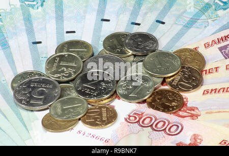 stack of coin and bond scattering Stock Photo - Alamy