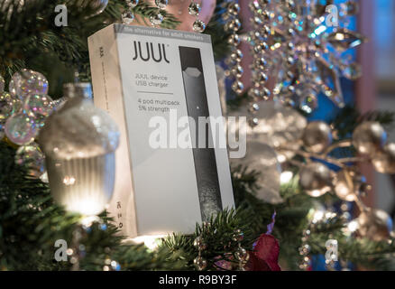Box holding JUUL nicotine dispenser and pods on Christmas tree Stock ...