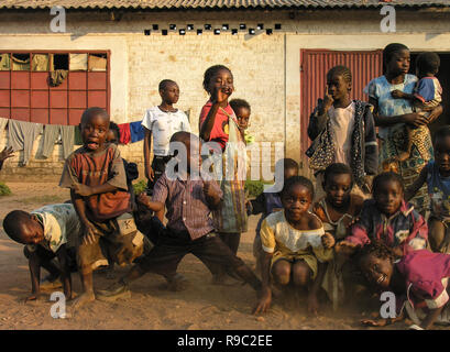Congolese children smile to the camera in a slum of Kinshasa, DR Stock ...